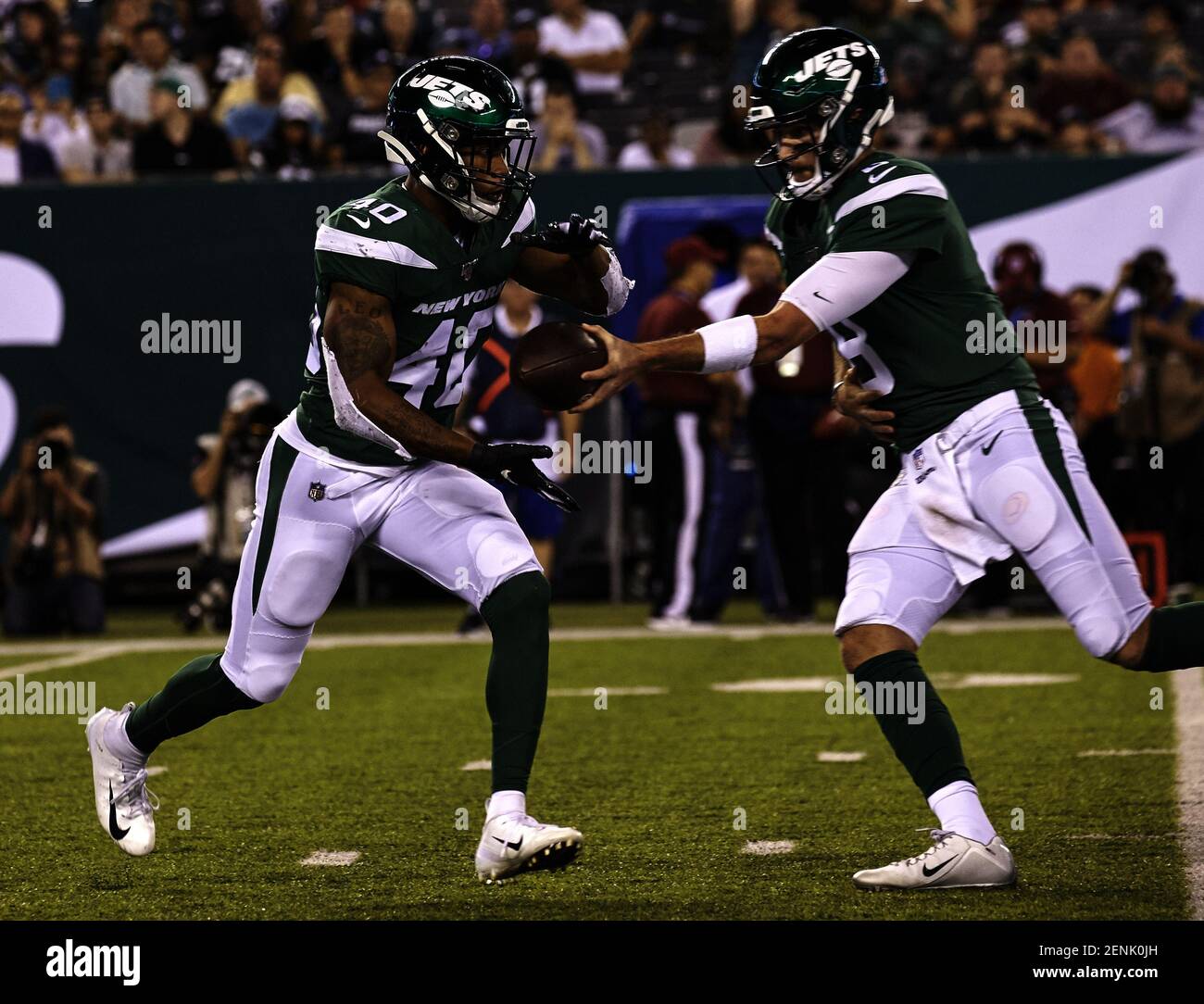 August 29, 2019, East Rutherford, New Jersey, USA: New York Jets quarterback Luke Falk (8) hands ...