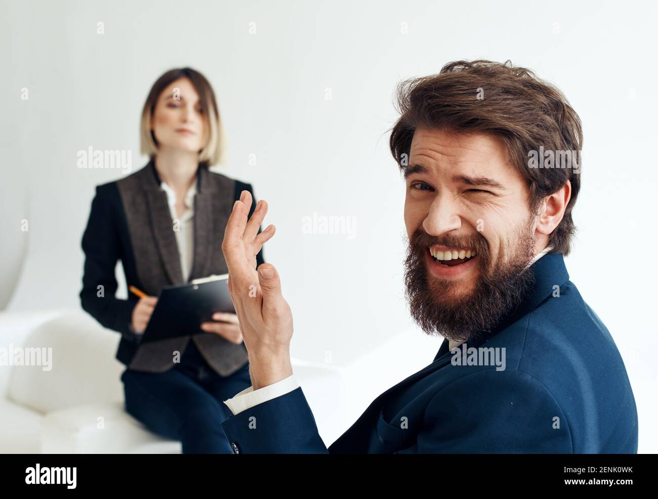 and emotional man at job interview and business woman in suit in the ...