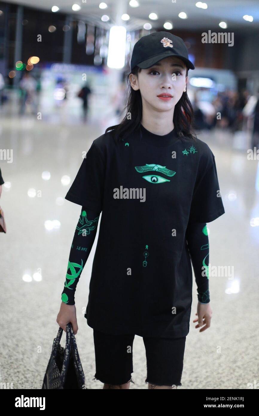 Chinese actress Wu Jiyan appears at an airport in Shanghai, China, 29 August 2019. Undershirt ...