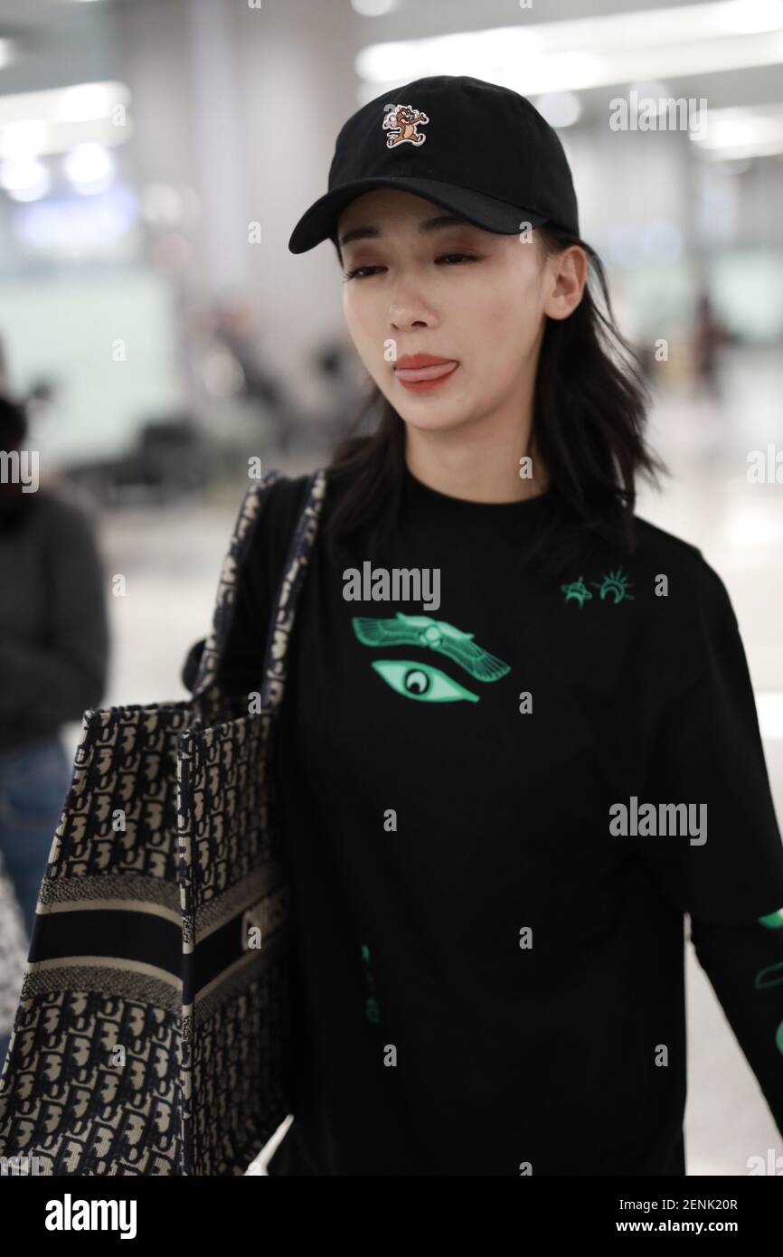 Chinese actress Wu Jiyan appears at an airport in Shanghai, China, 29 August 2019. Undershirt ...