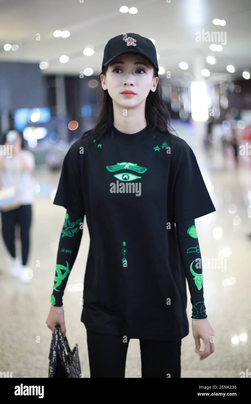 Chinese actress Wu Jiyan appears at an airport in Shanghai, China, 29 August 2019. Undershirt ...
