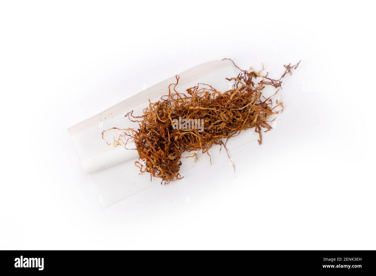 top view of cigarette tobacco roll paper and filter isolated on white ...