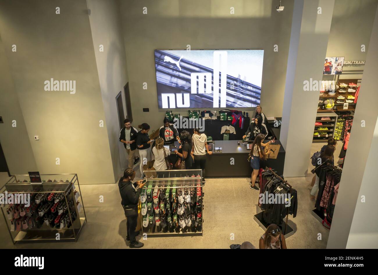 Shoppers and visitors flock to the newly opened Puma flagship store on ...