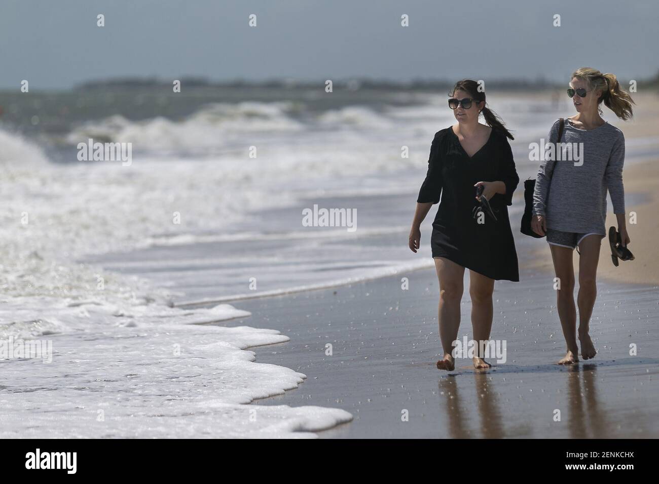 Abbey Stapleton, 29, and her sister-in-law, Ashley Stapleton, 30, walk ...