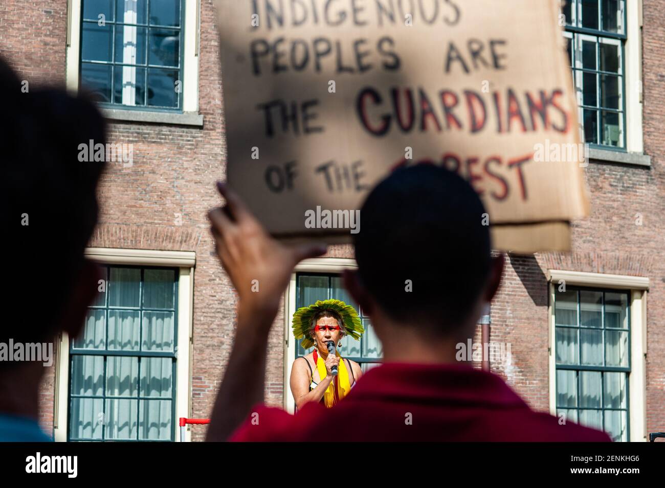 Sandra Batista, Brazilian artist and activist speaks during the protest ...