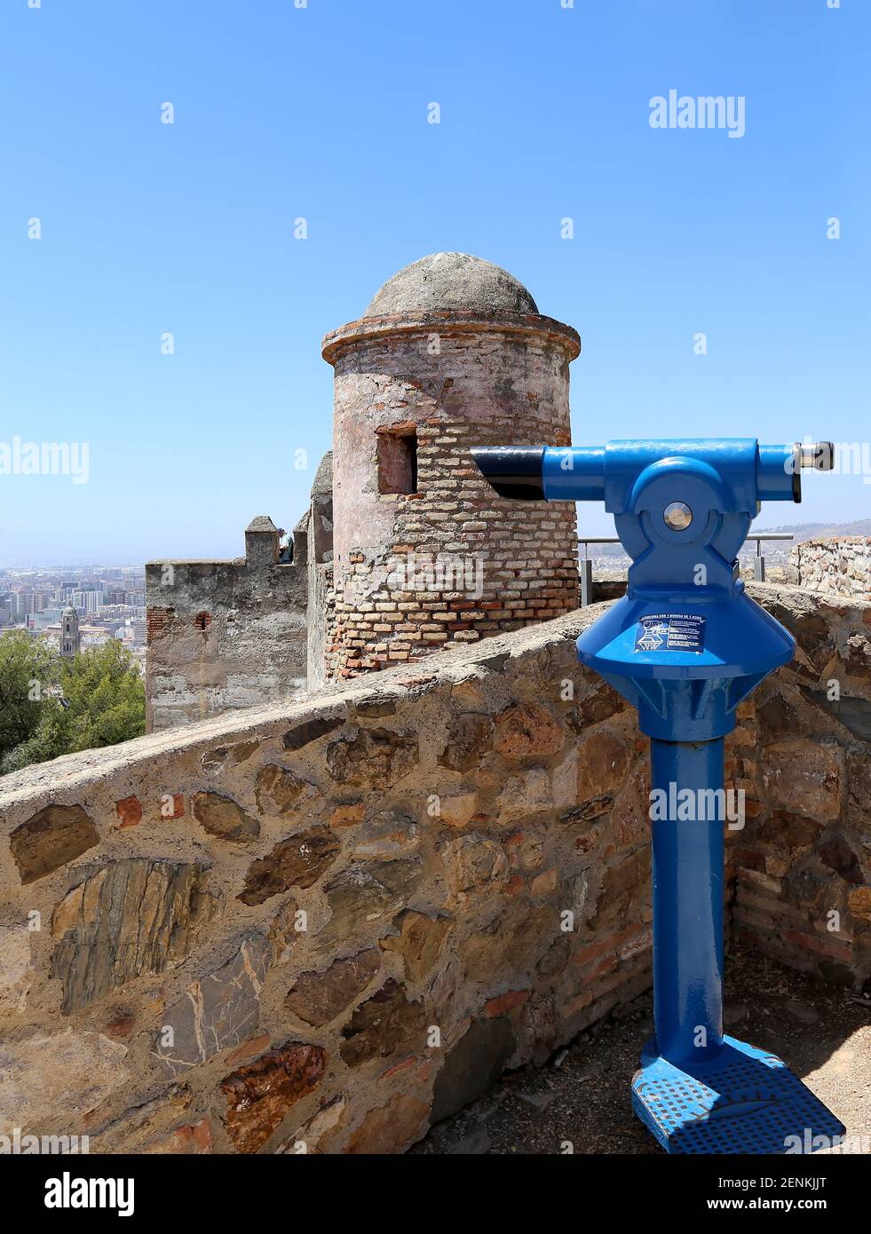 Telescope viewer overlooking the Gibralfaro Castle in Malaga, Andalusia ...