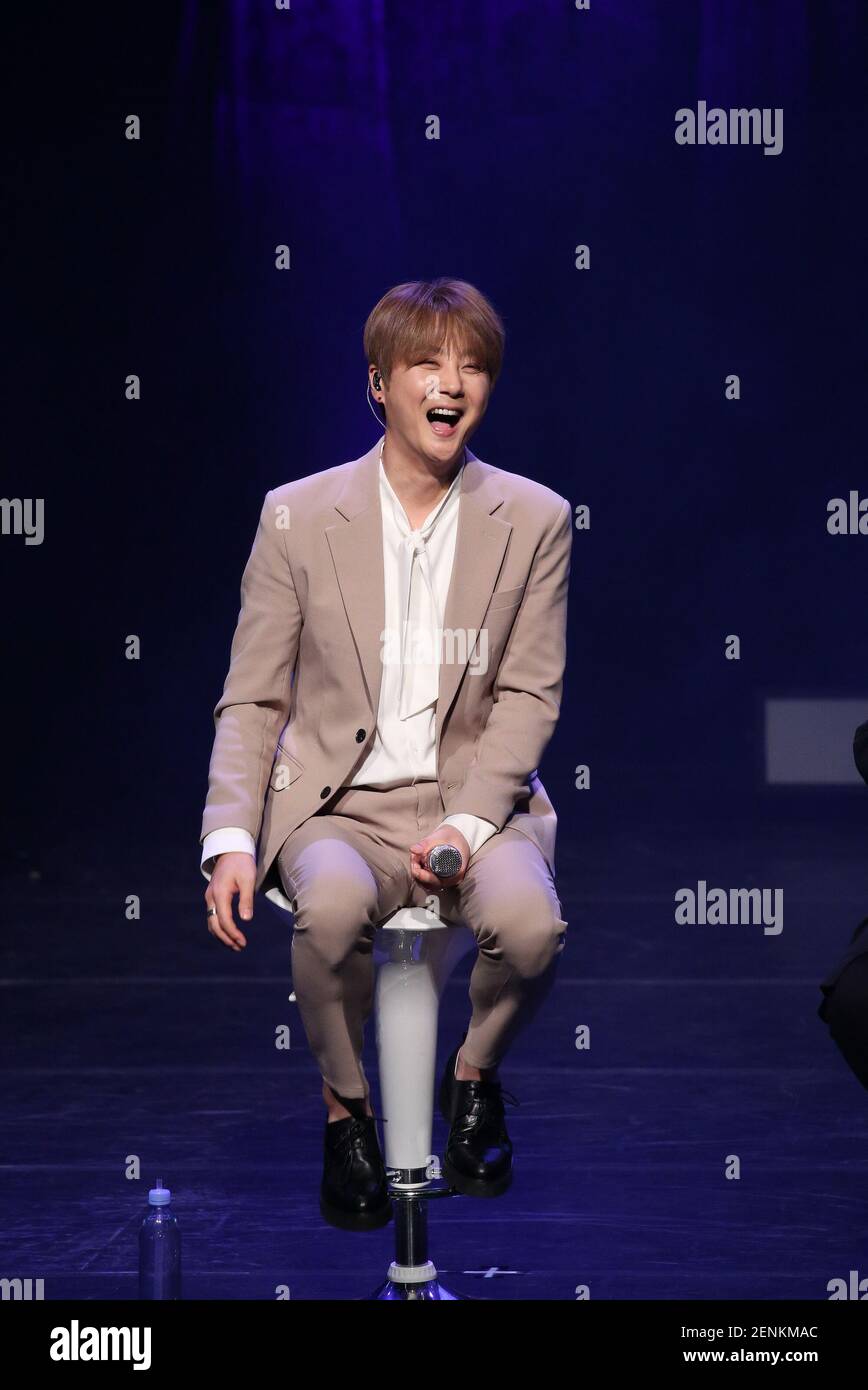 South Korean singer Shin Hye-sung of Korean boy group Shinhwa interacts ...