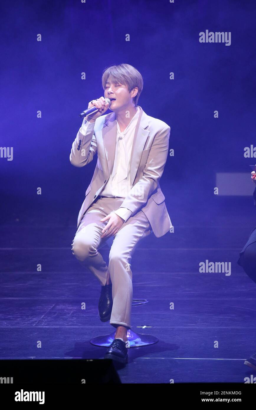 South Korean singer Shin Hye-sung of Korean boy group Shinhwa interacts ...