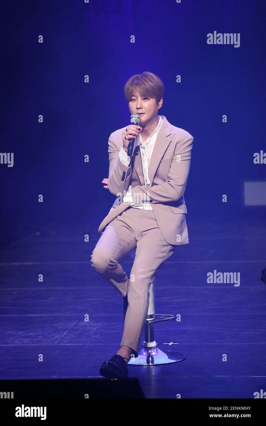 South Korean singer Shin Hye-sung of Korean boy group Shinhwa interacts ...