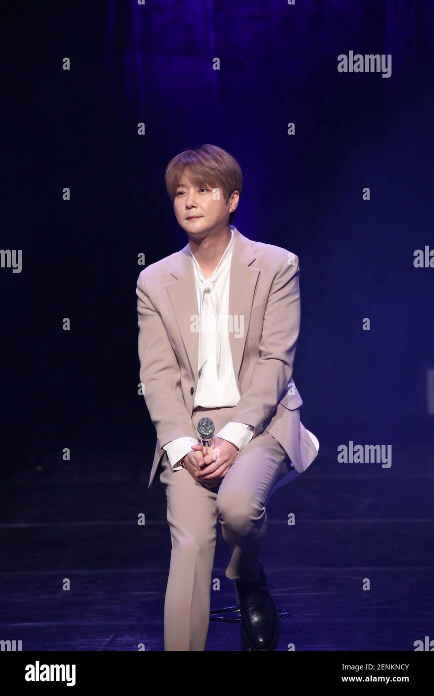 South Korean singer Shin Hye-sung of Korean boy group Shinhwa interacts ...