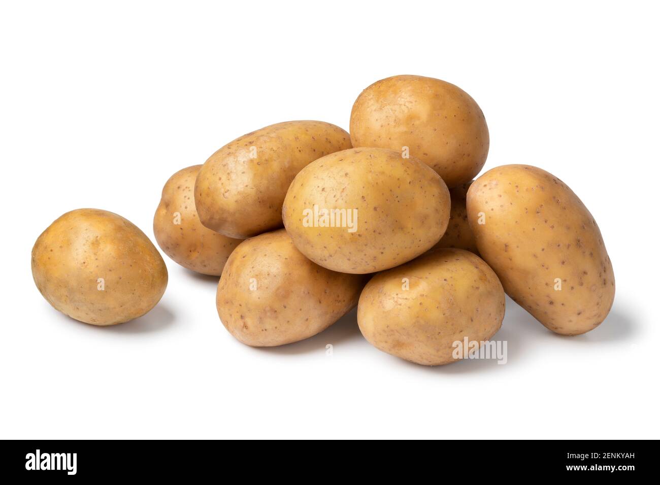Heap of fresh raw Nicola potatoes isolated on white background Stock ...