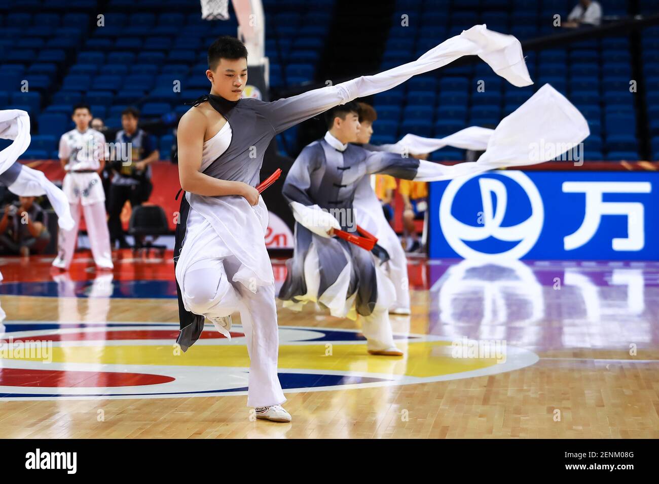 Chinese cheer team performs martial art and dances at the second round ...