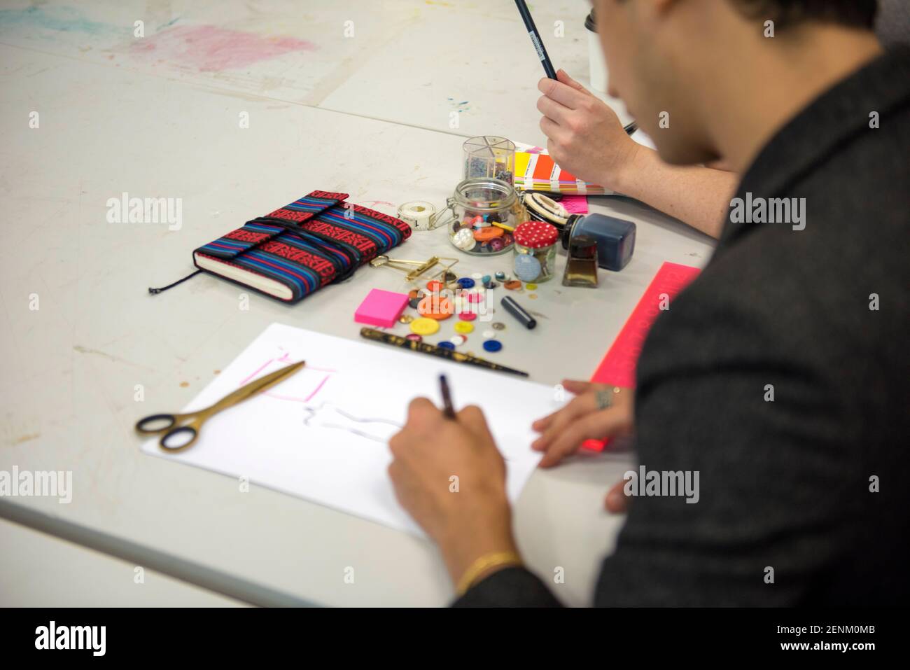 Fashion student sketching design Stock Photo - Alamy