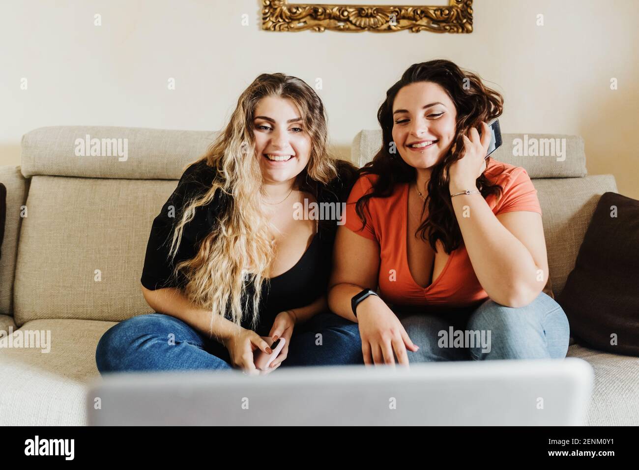 Female friends on video call Stock Photo - Alamy