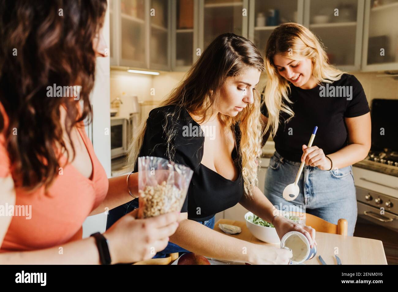 Women preparing food in hi-res stock photography and images - Alamy