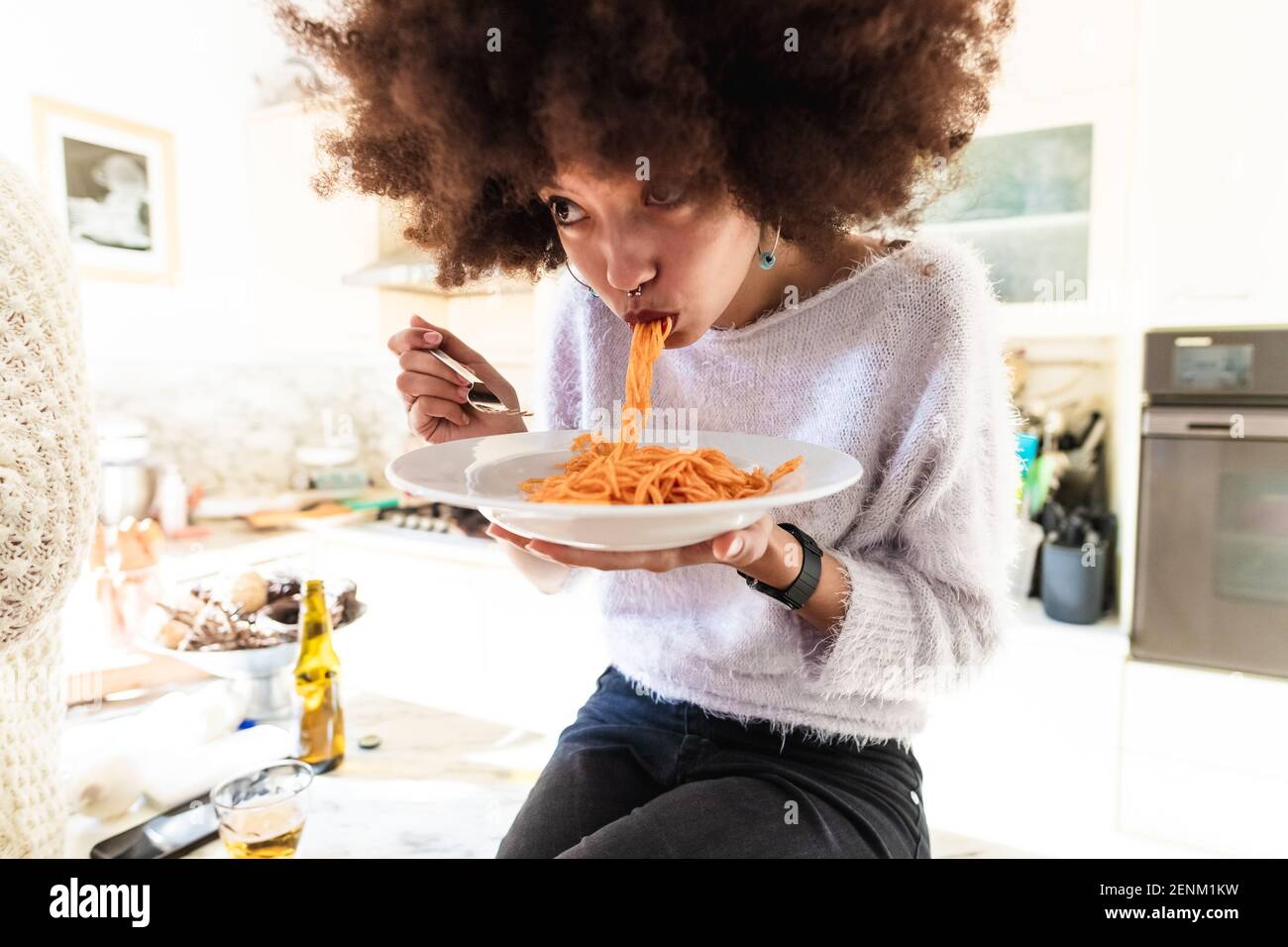 Woman eating spaghetti italy hi-res stock photography and images - Alamy