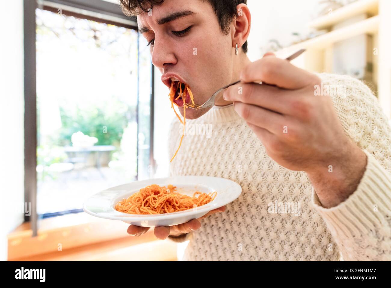 Fork spaghetti pasta mouth hi-res stock photography and images - Alamy