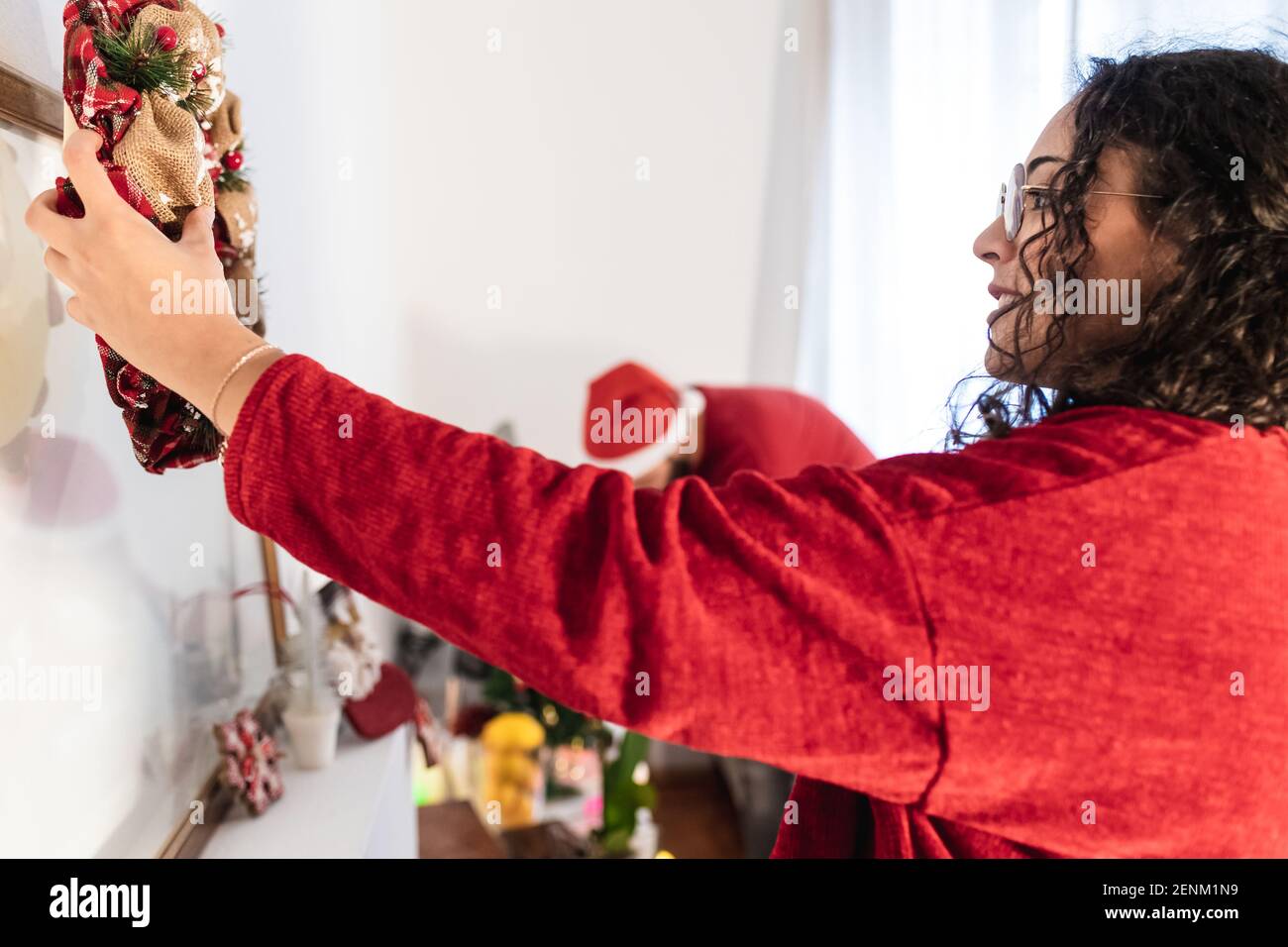 Putting Up Christmas Decorations High Resolution Stock Photography and ...