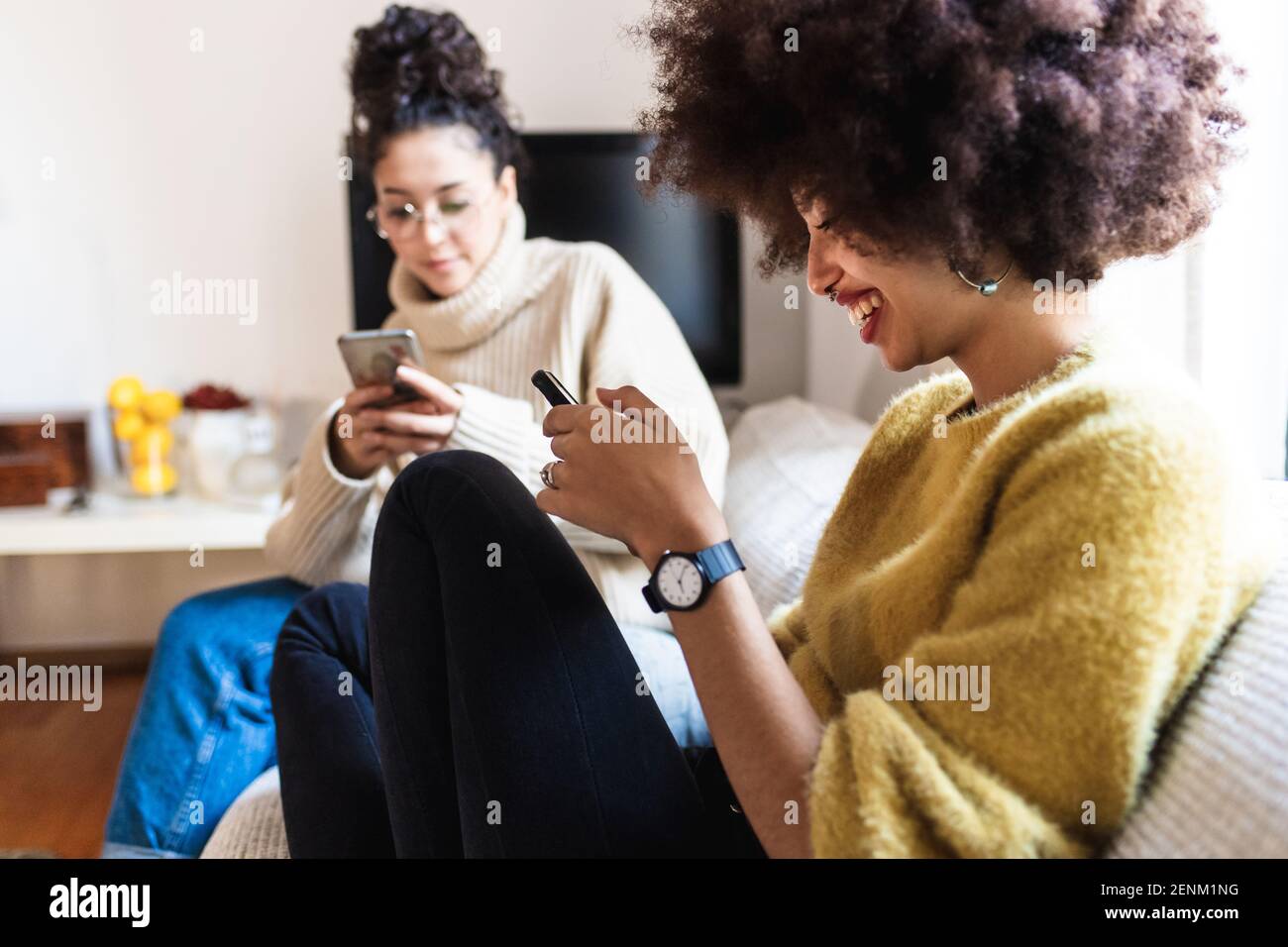 Ethnic group focus phones hi-res stock photography and images - Alamy