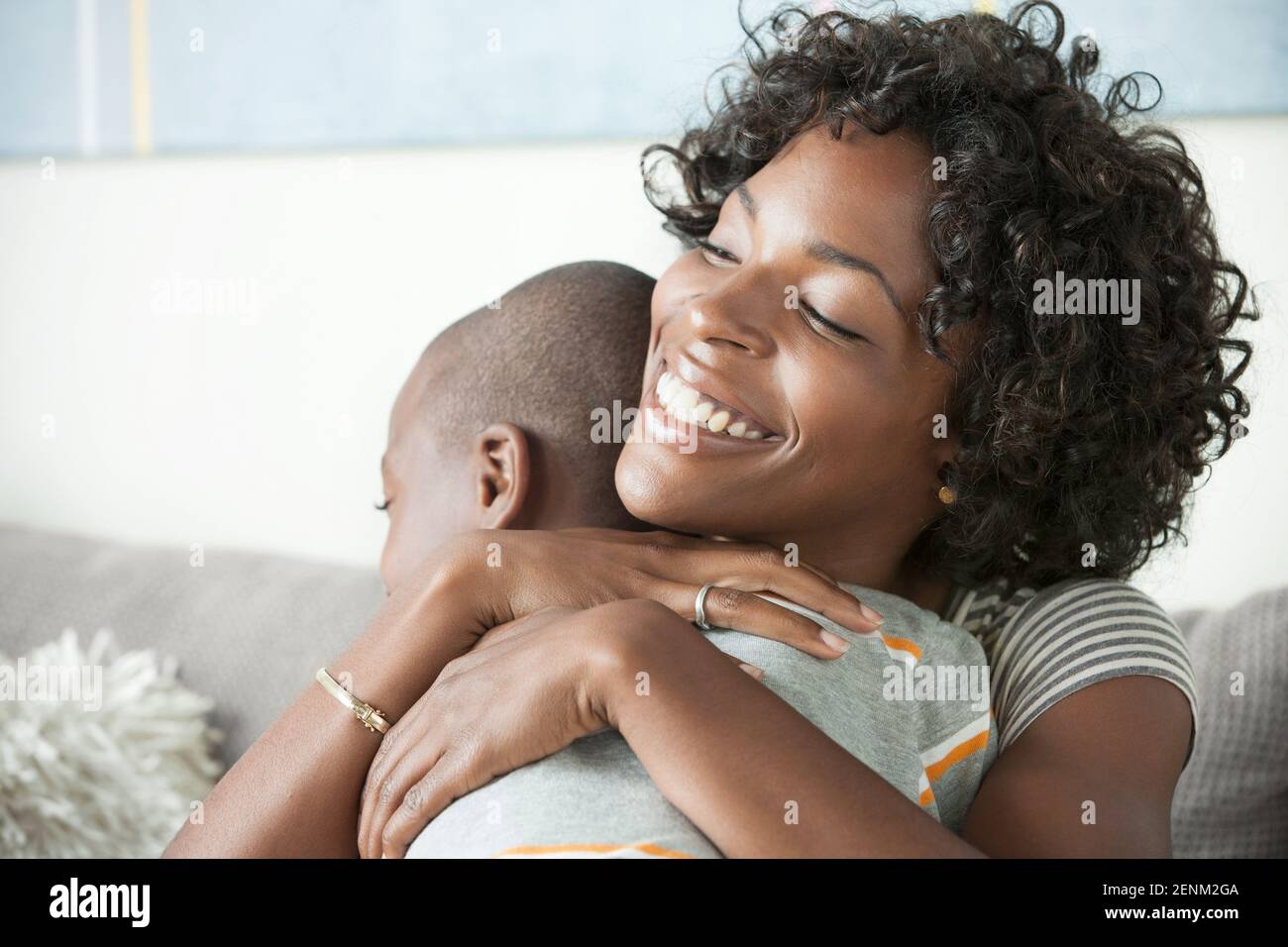 Portrait of mother hugging son Stock Photo - Alamy