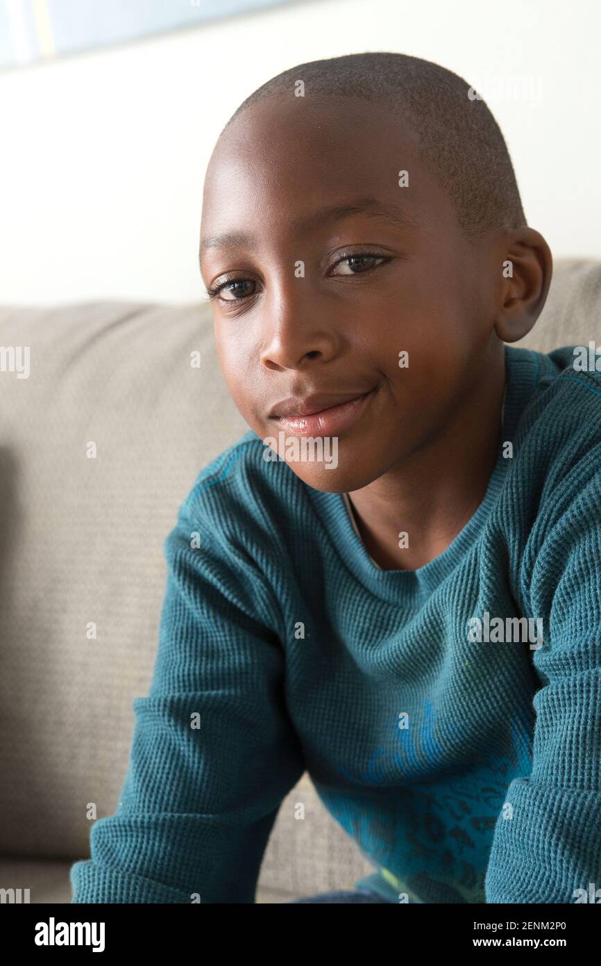 Portrait of boy looking at camera Stock Photo - Alamy
