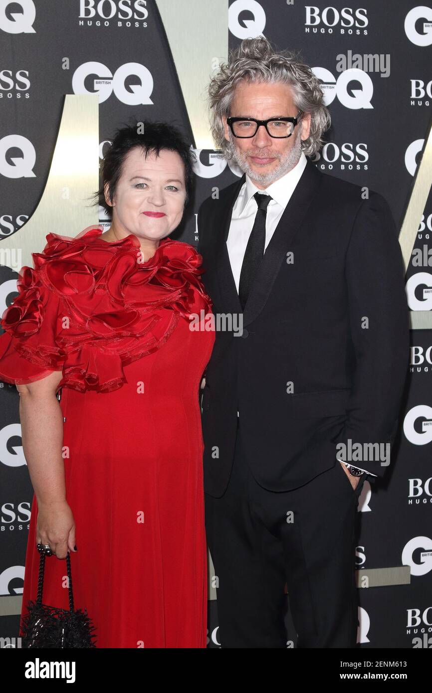Dexter Fletcher and wife Dalia Ibelhauptaite attend the GQ Men of the ...