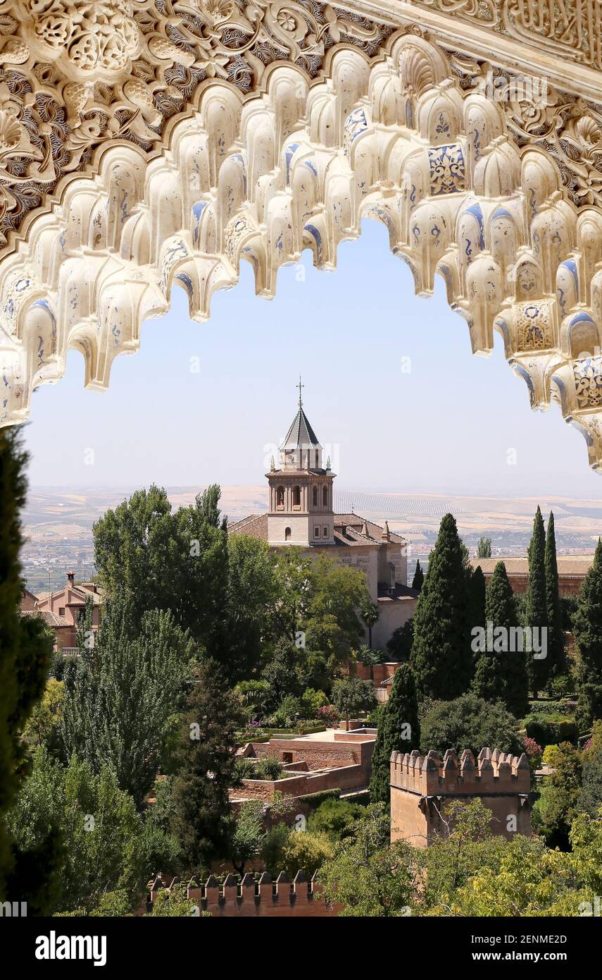 Arches in Islamic (Moorish) style and Alhambra, Granada, Spain Stock ...