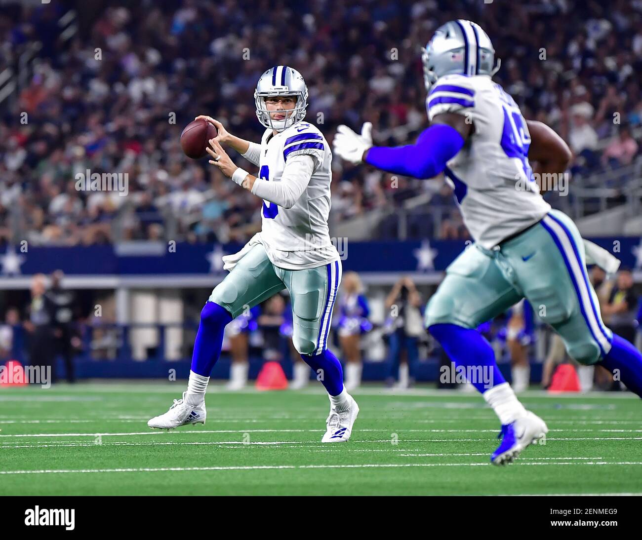 August 24th, 2019:.Dallas Cowboys quarterback Mike White (3) rolls out ...