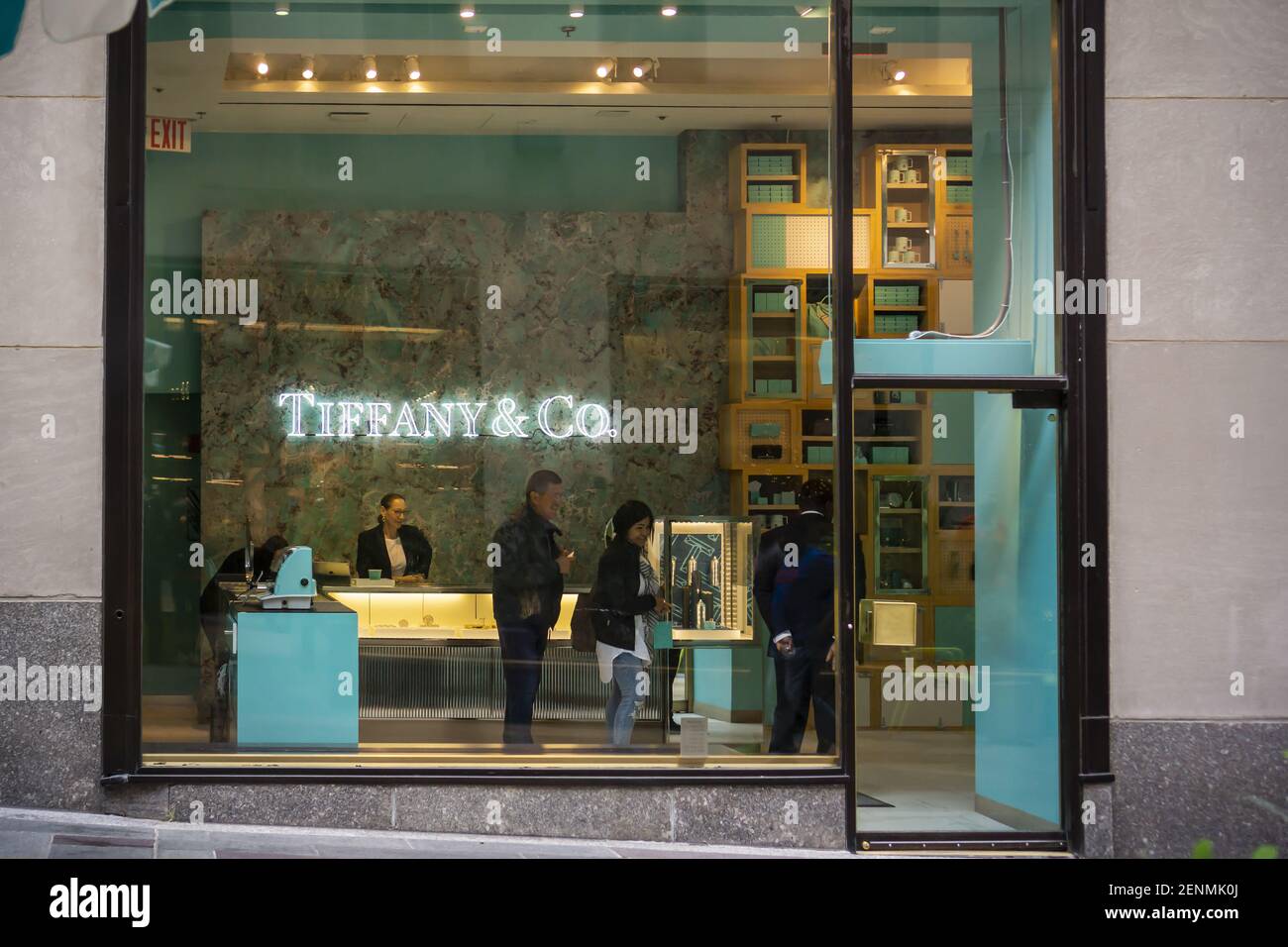 Customers shop in the Tiffany & Co. store in Rockefeller Center in New ...
