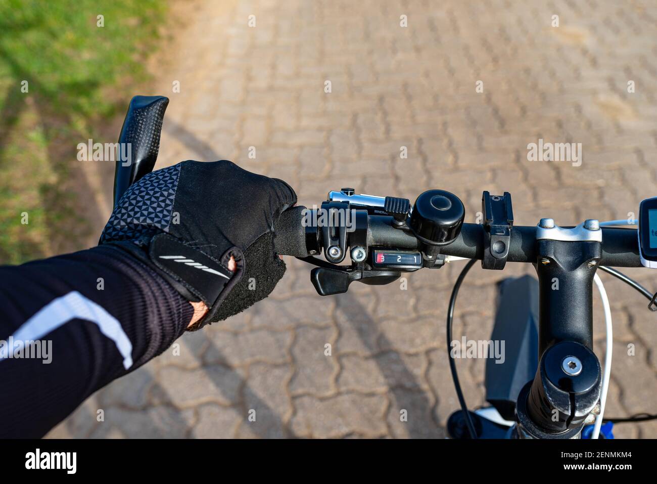 A bicycle handlebar seen from the first person perspective and with a ...