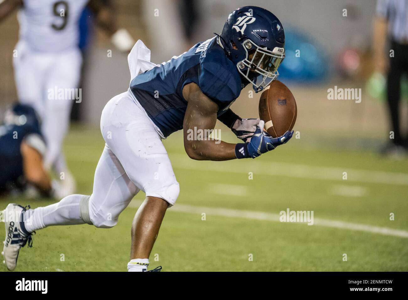 September 6, 2019: Rice Owls running back Aston Walter (1) hauls in a ...