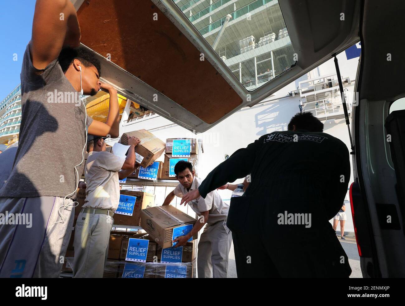 Hurricane Dorian food relief boxes are loaded onto trucks after ...