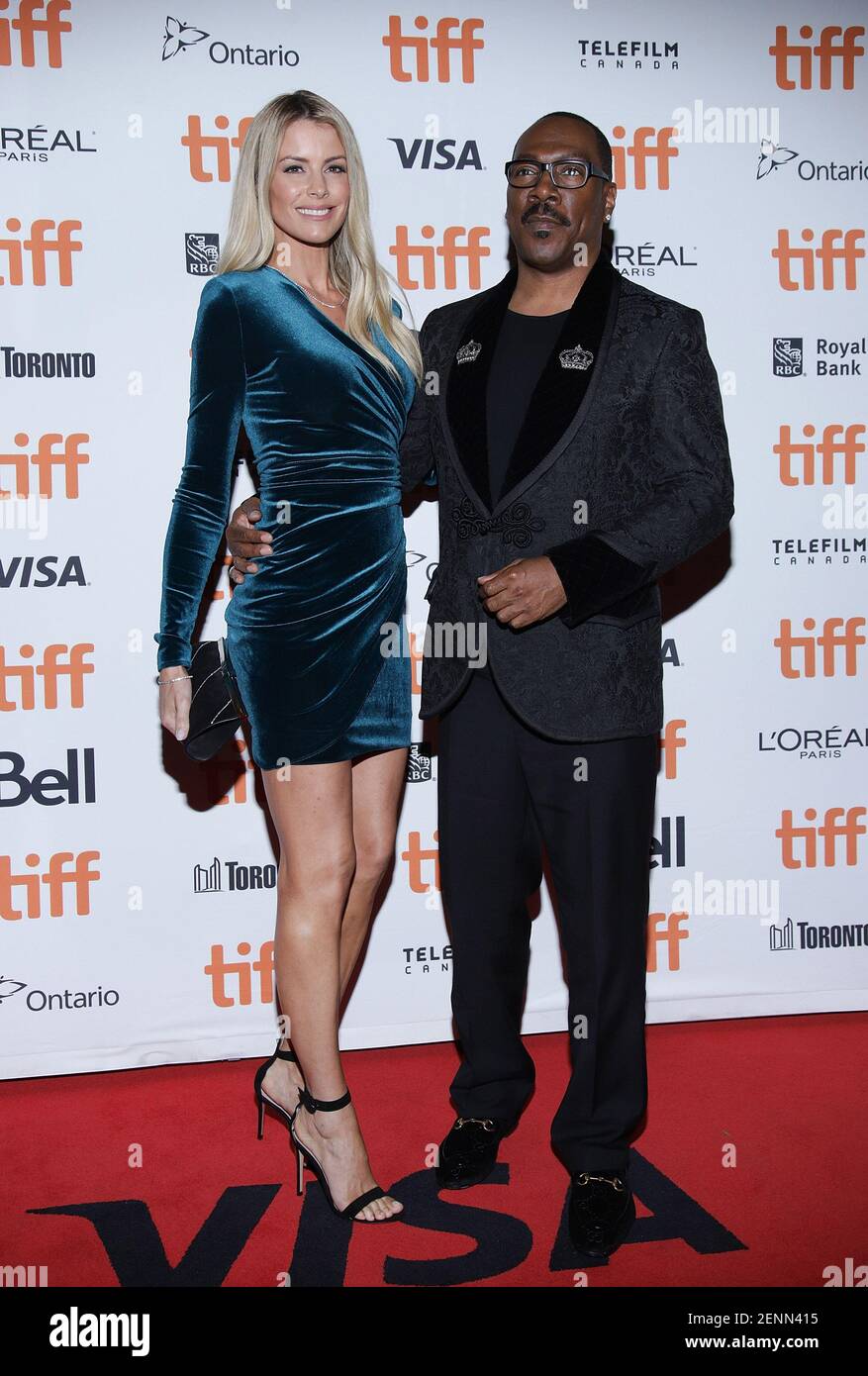 TORONTO, ONTARIO - SEPTEMBER 07: Eddie Murphy, Paige Butcher attend the ...