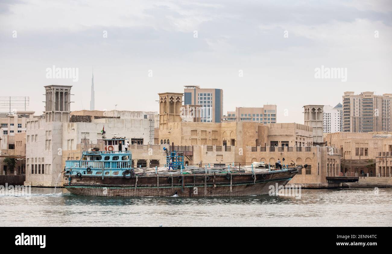 Dubai, United Arab Emirates, 25th February 2021: old Dhow transporting ...