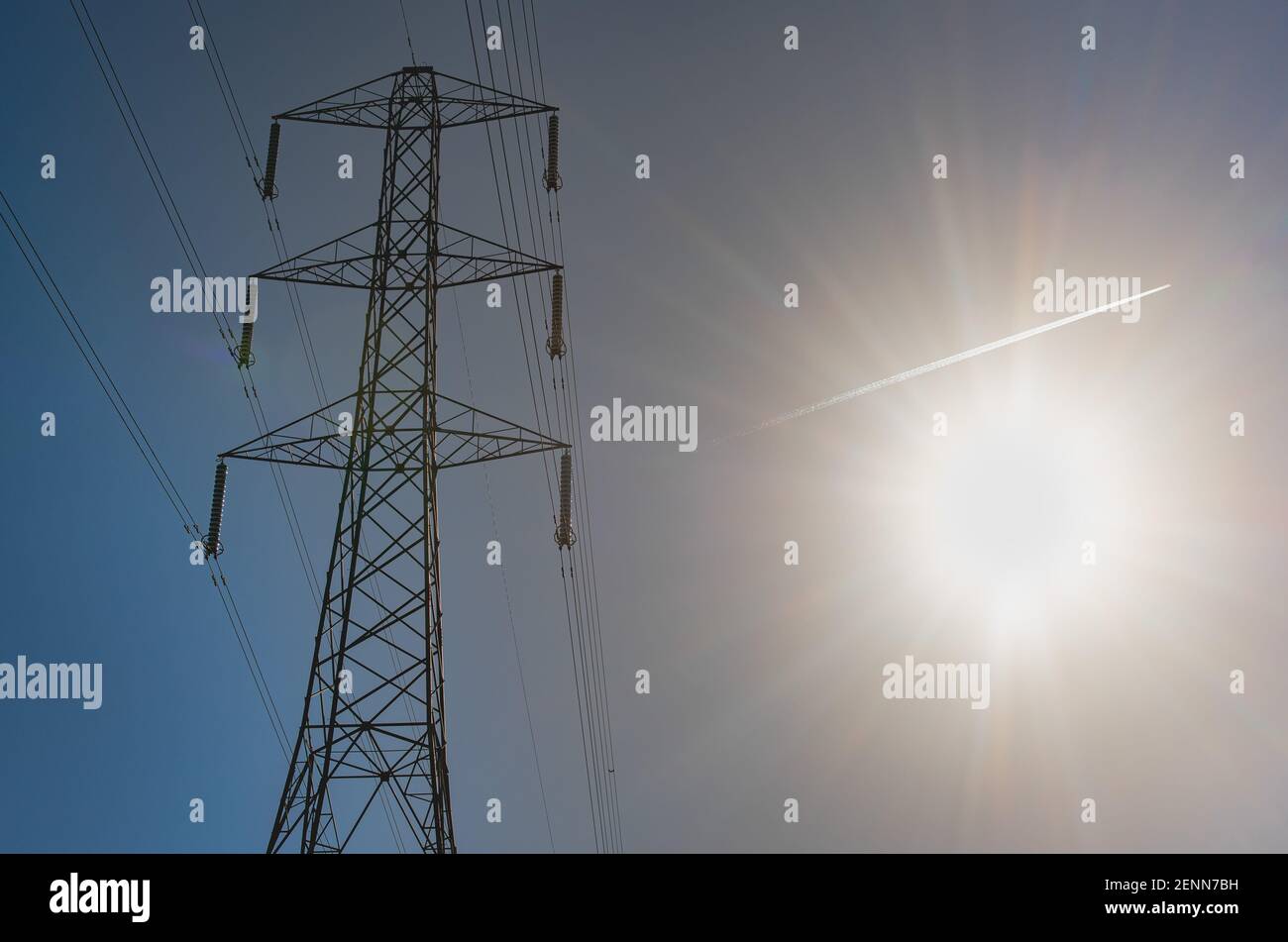 Steel lattice tower electrical pylon carrying overhead transmission ...
