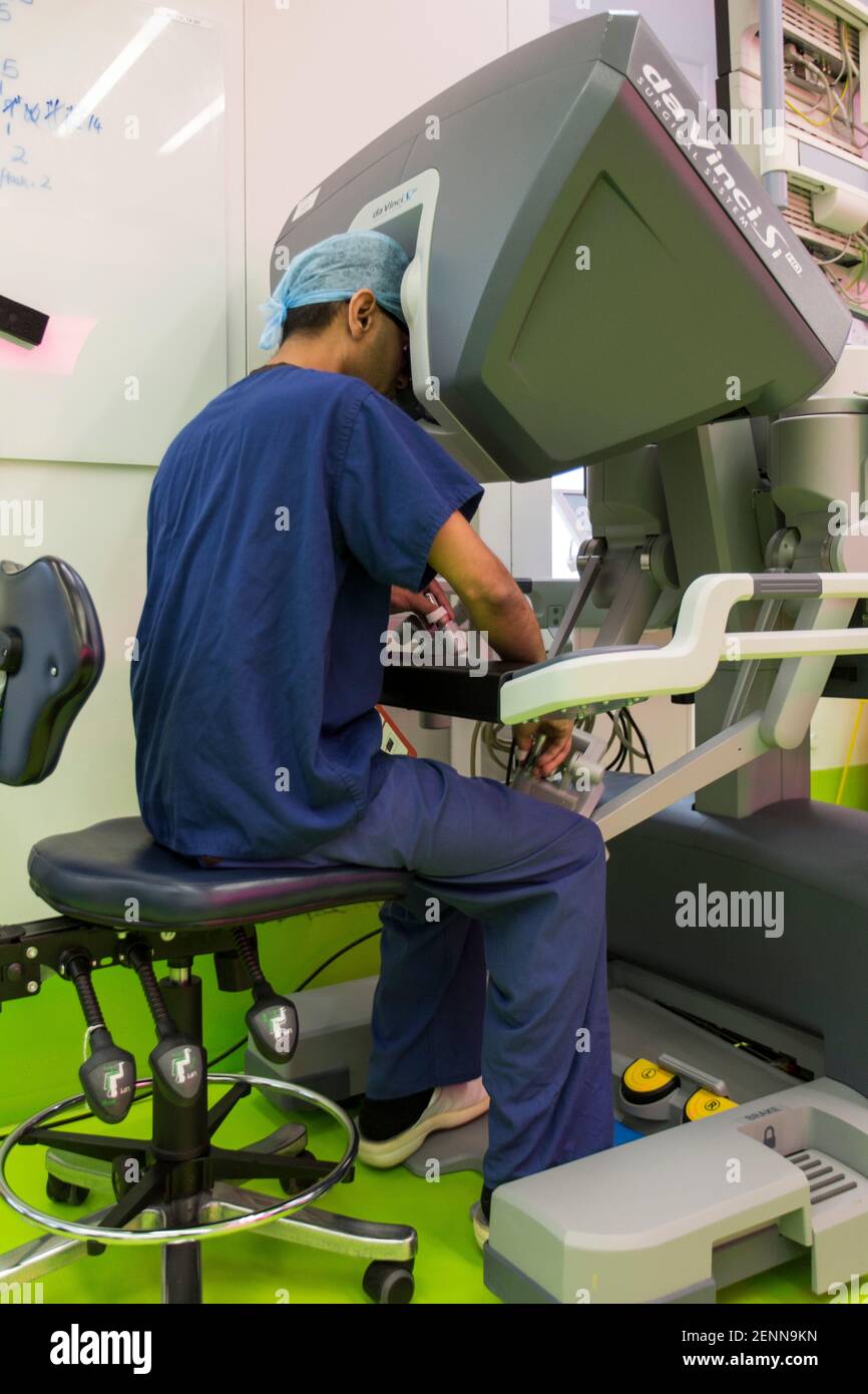 Surgeons perform an operation at an operating theatre hi-res stock ...