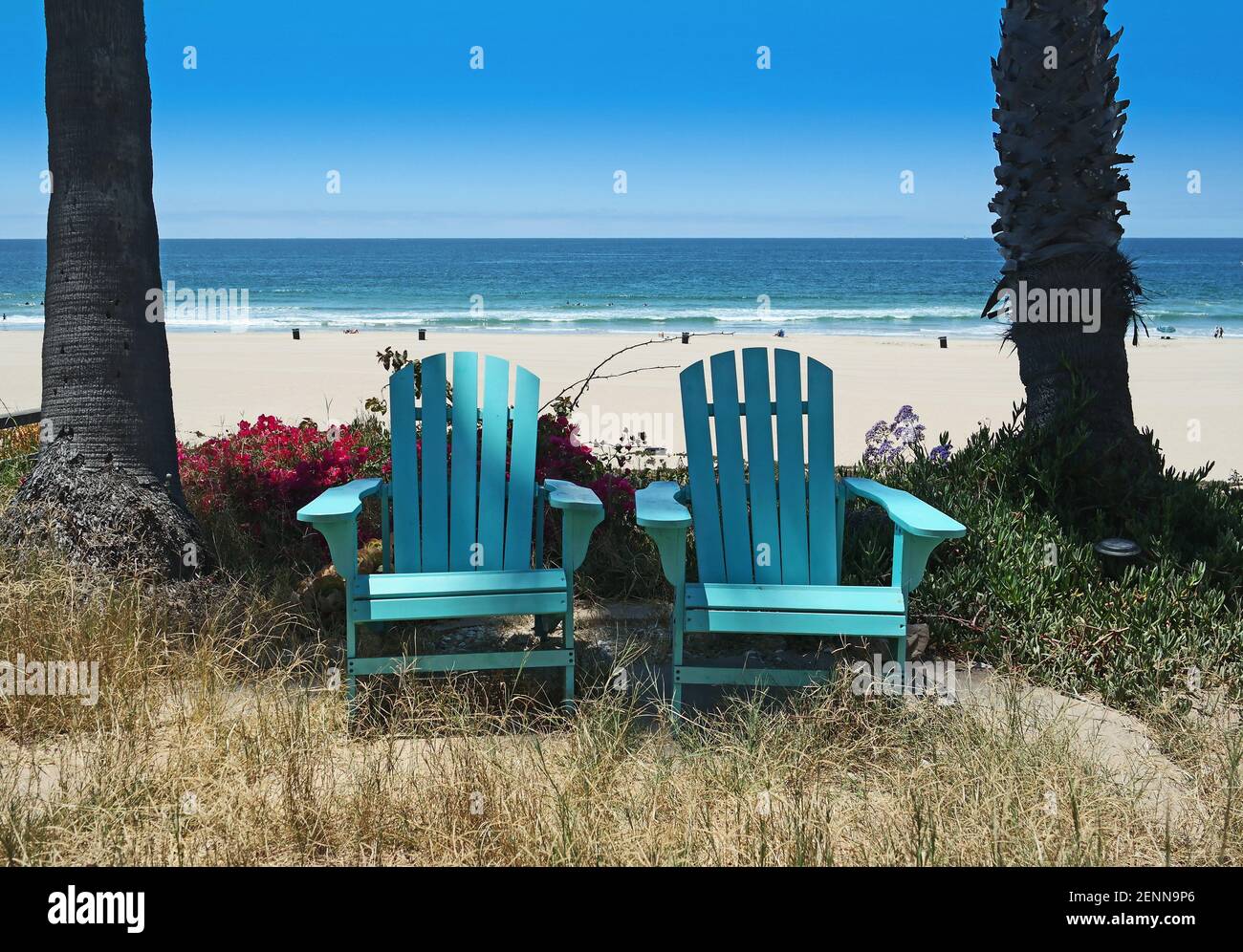 Blue Adirondack Chairs at Beach Stock Photo - Alamy