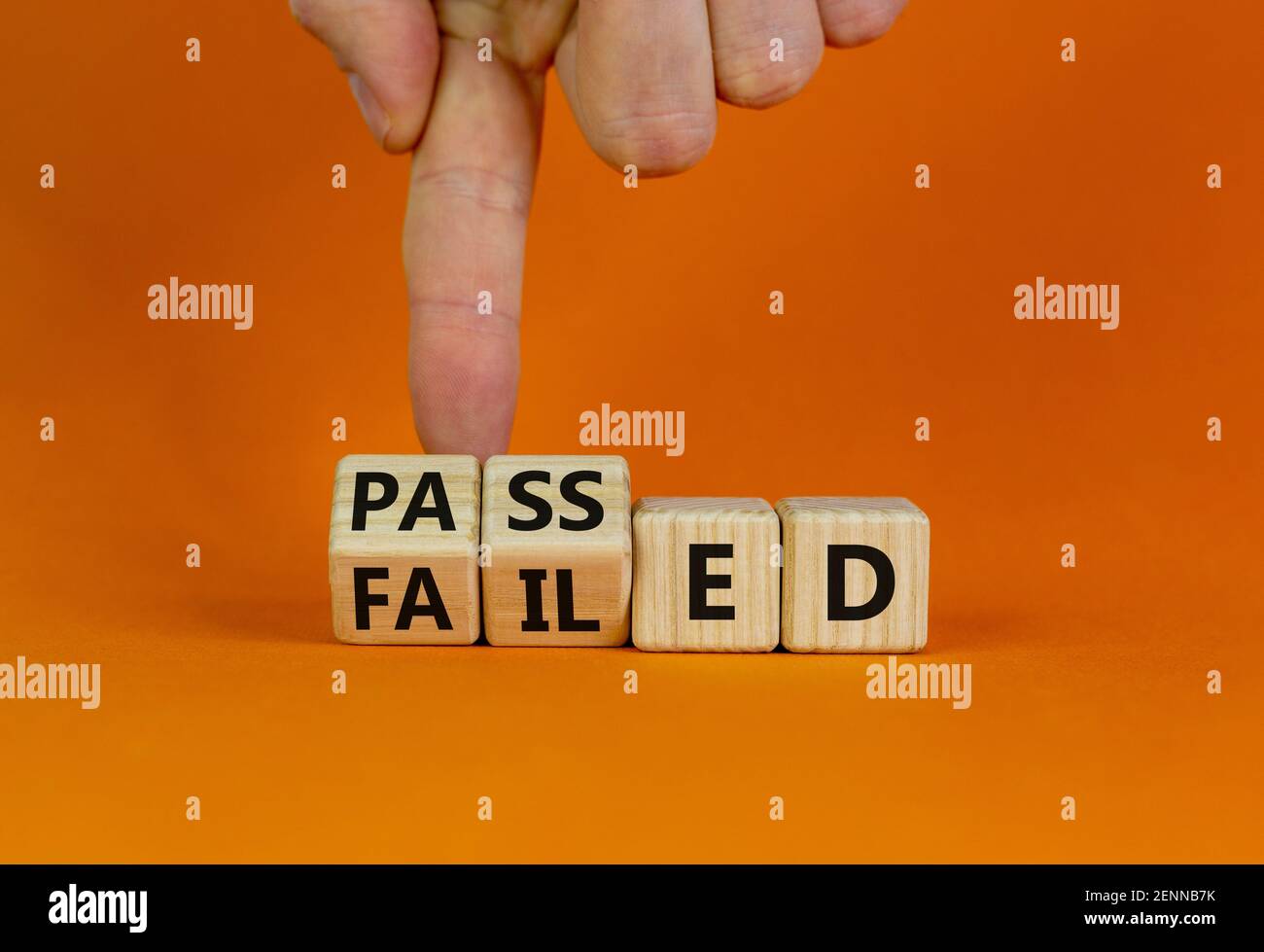 Passed or failed symbol. Businessman turns wooden cubes and changes the ...