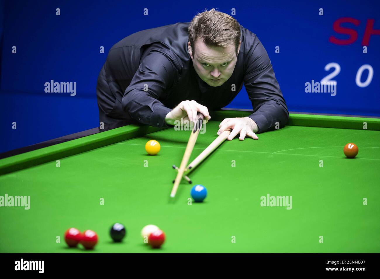 English professional snooker player Shaun Murphy plays a shot at the ...