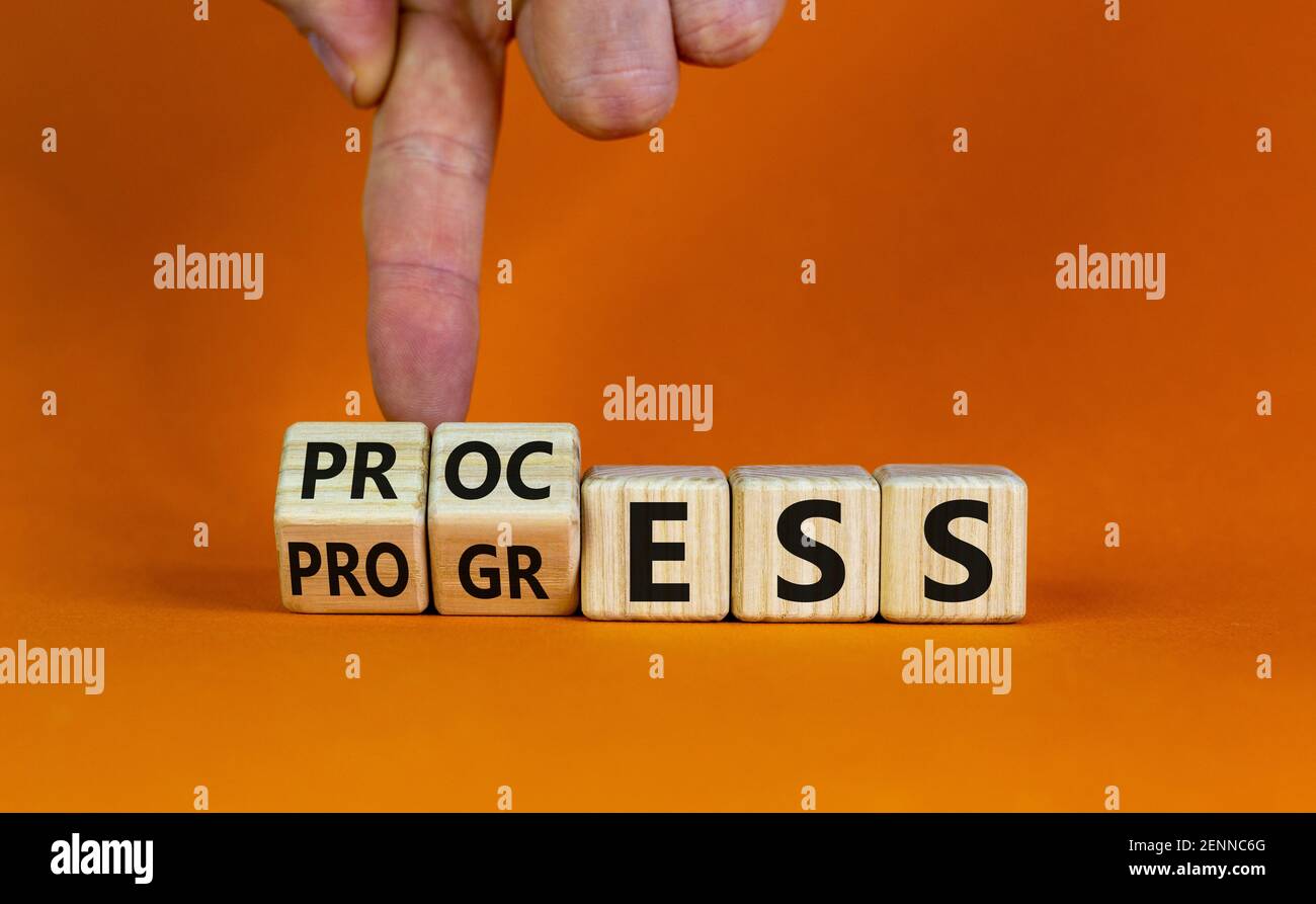 Process and progress symbol. Businessman turns wooden cubes and changes ...