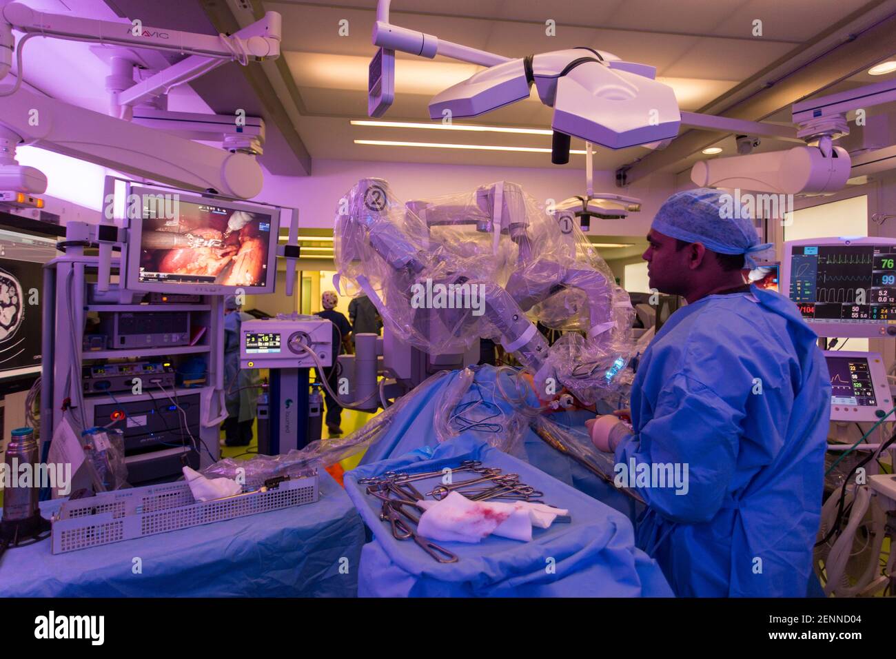 Surgeons perform an operation at an operating theatre hi-res stock ...
