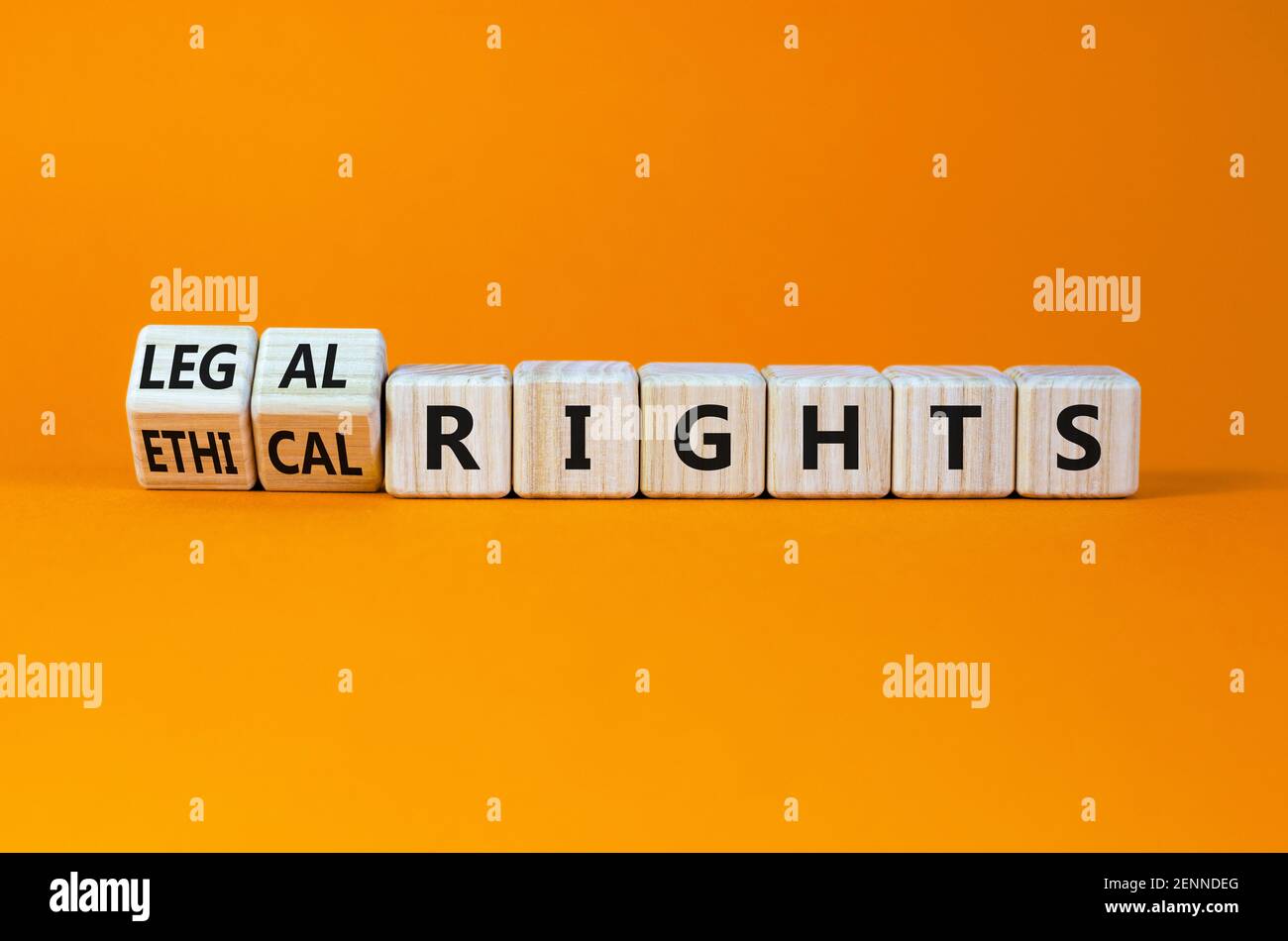 Ethical or legal rights symbol. Turned wooden cubes and changed words ...