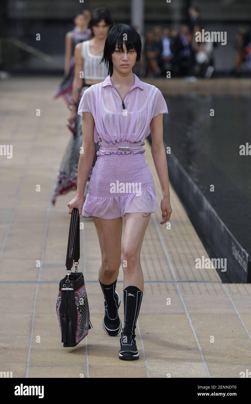 Model Sora Choi walking on the runway during the Longchamp Fashion Show ...