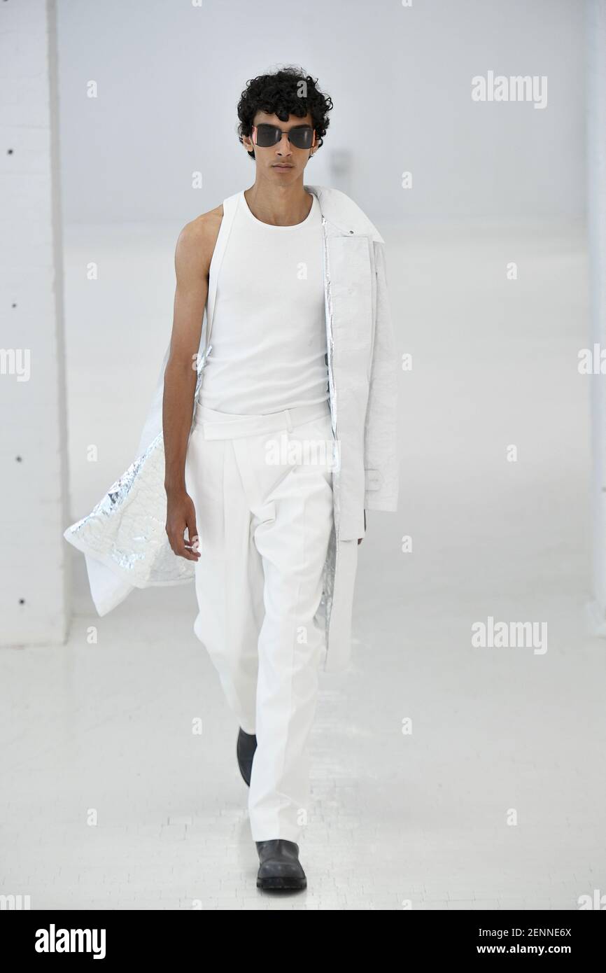Model Callum Stoddart walking on the runway during the Helmut Lang ...