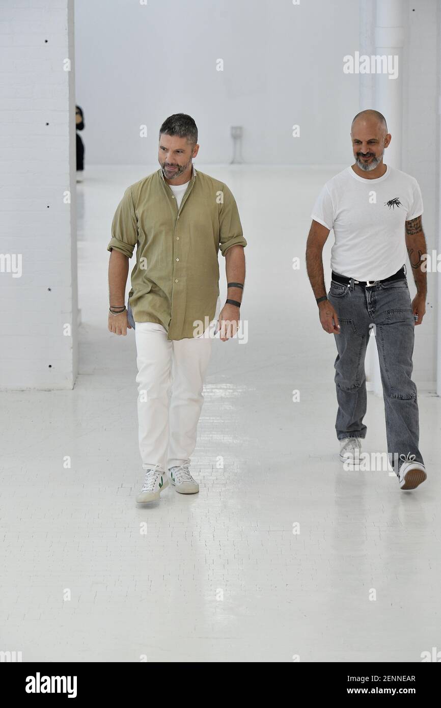 Designers Mark Thomas and Thomas Cawson walking on the runway during ...