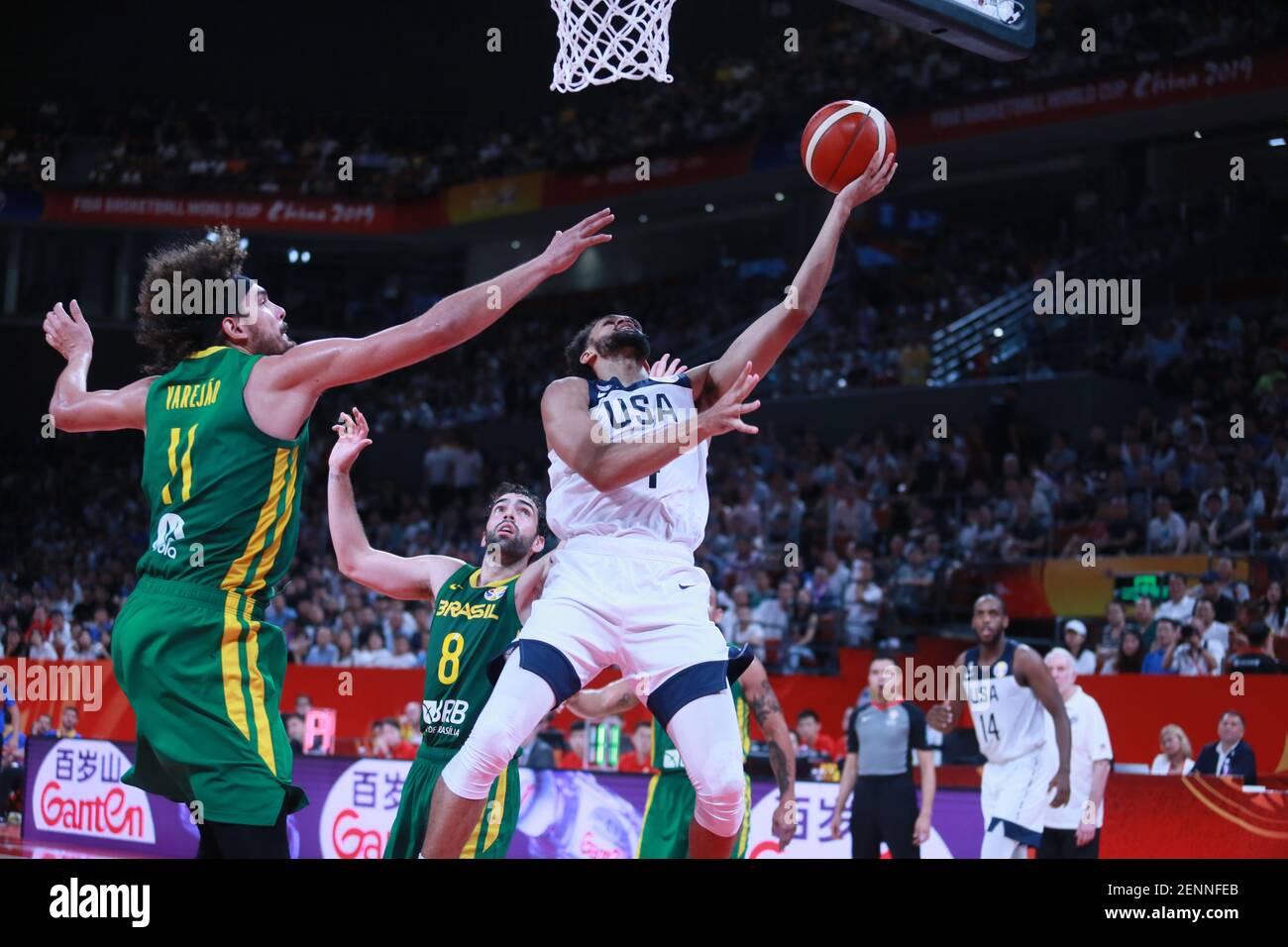Marcus Smart of the United States drives to the basket to score against ...