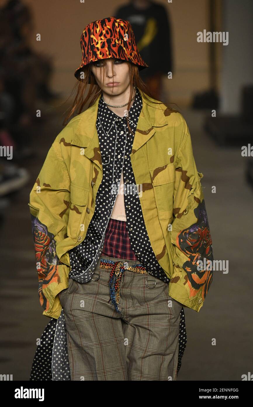 Model Remington Williams walking on the runway during the R13 Fashion ...