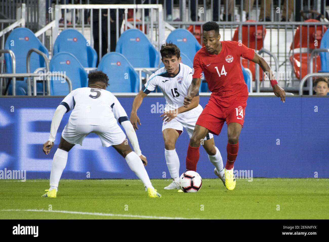 Mark-Anthony Kaye (14), Daniel Morejon (5) and Lazaro Monzon (15) are ...
