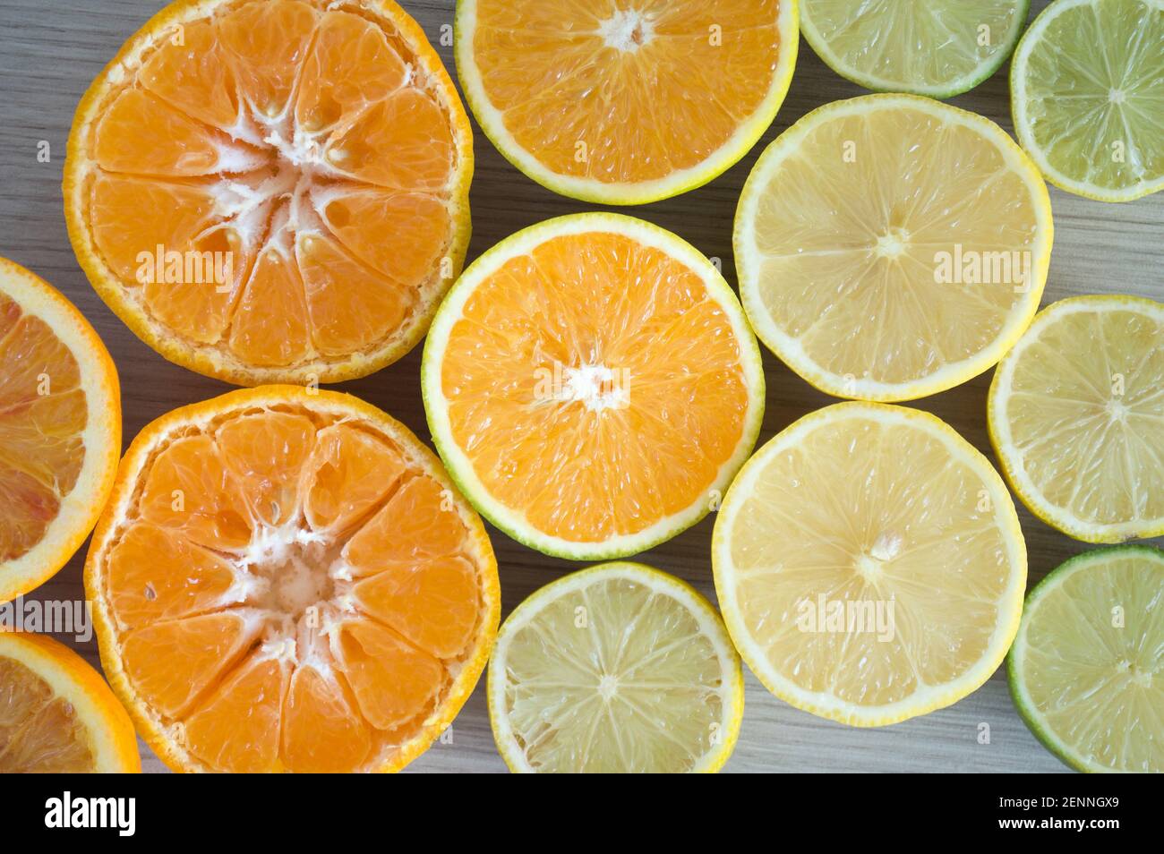 Citric fruit halves over wood hi-res stock photography and images - Alamy