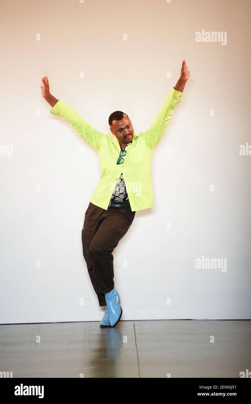Designer Christopher John Rogers walking on the runway Christopher John ...
